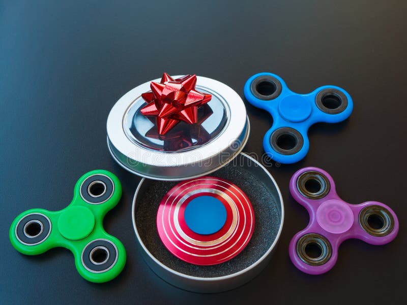 Popular Colourful Fidget Spinner Toy in a Gift Box on a Black ...