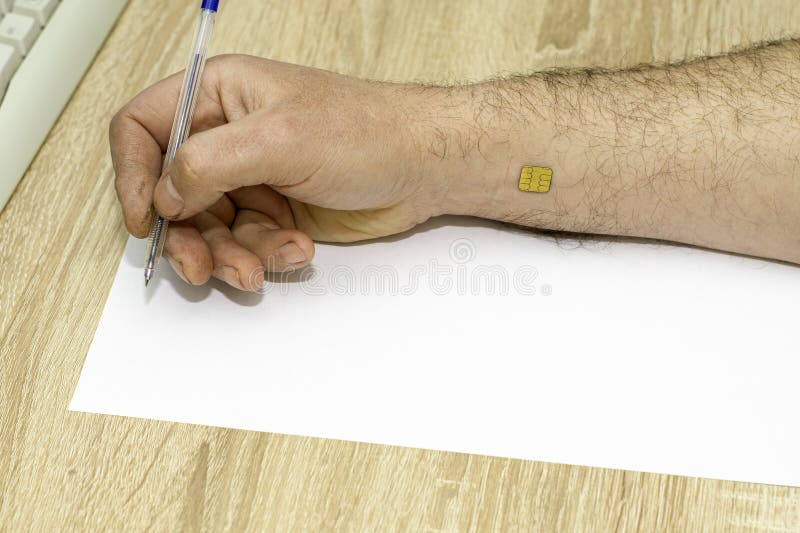 Population Chipization Concept: a Person Writes on the Piece of Paper a ...