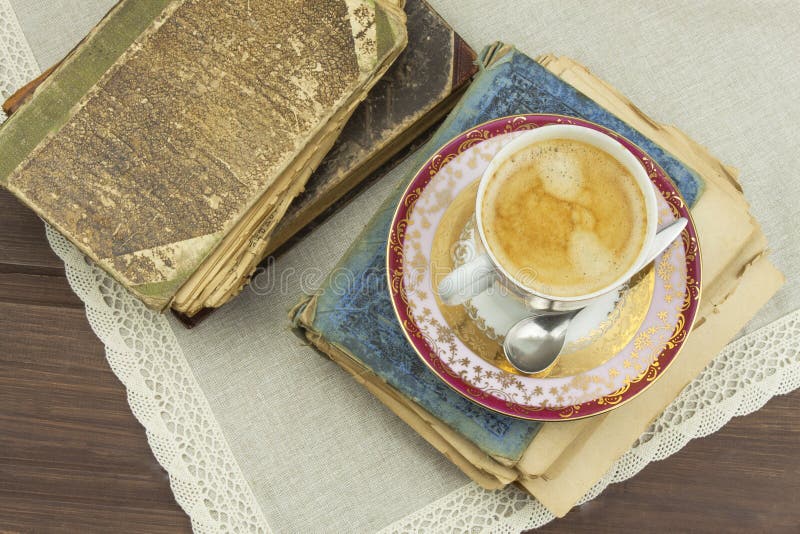 Porcelain Cup of Coffee and Old Books. Relax Over Coffee Stock Photo ...