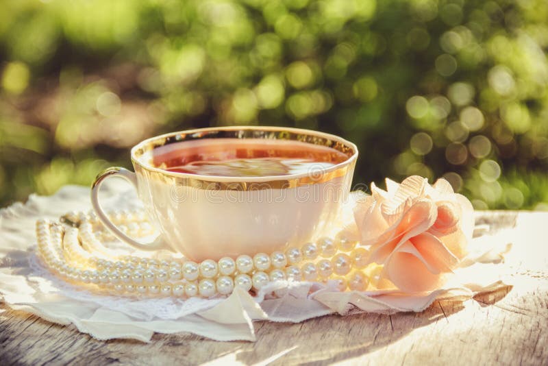 Porcelain Cup of Tea in the Summer Garden. Tea in the Garden Stock ...