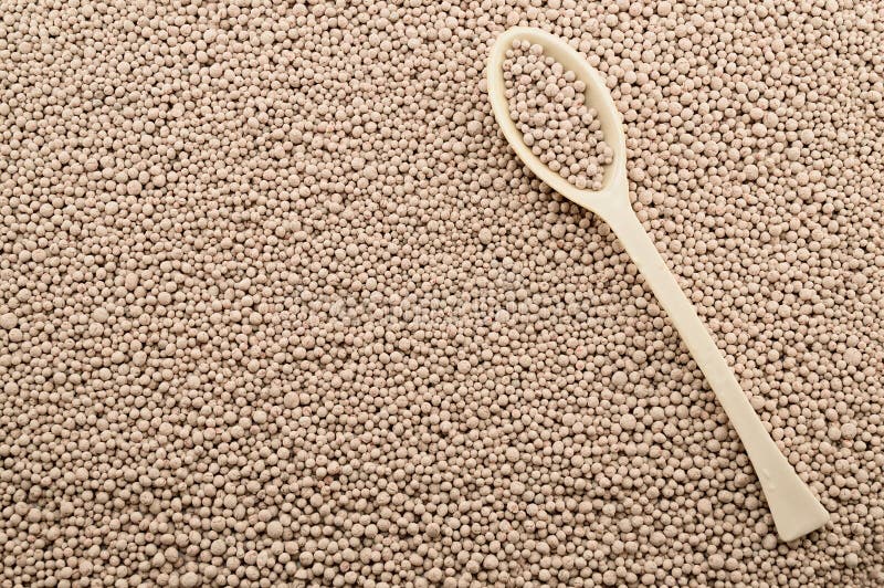 Porcelain Laboratory Spoon and Beaker on Mineral Fertilizers Stock ...