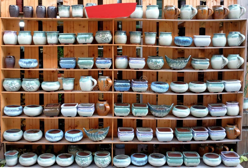 Porcelain pots in rows stock image. Image of artworksit - 118708949