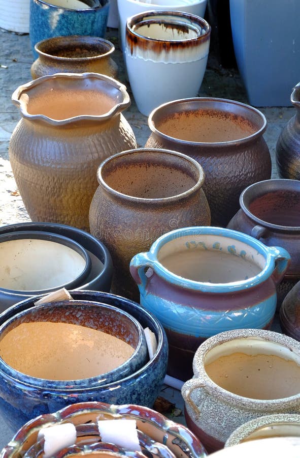 Porcelain pots in rows stock photo. Image of ancestor - 118708090