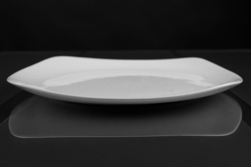 Porcelain shallow dish stock image. Image of setting - 86413681