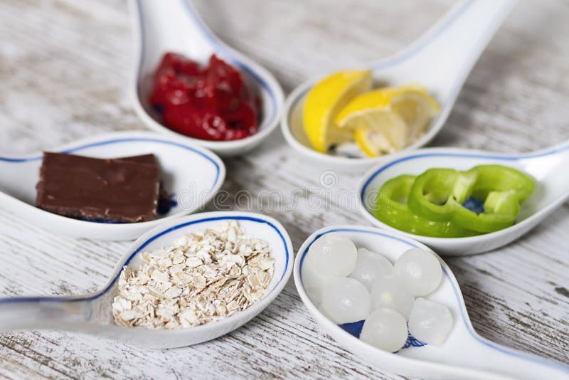Porcelain spoons with food stock image. Image of ceramic - 123620275
