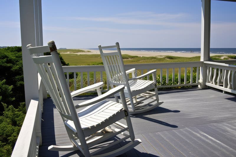 Porch with Rocking Chairs and View of the Beach on Cape Cod Stock ...