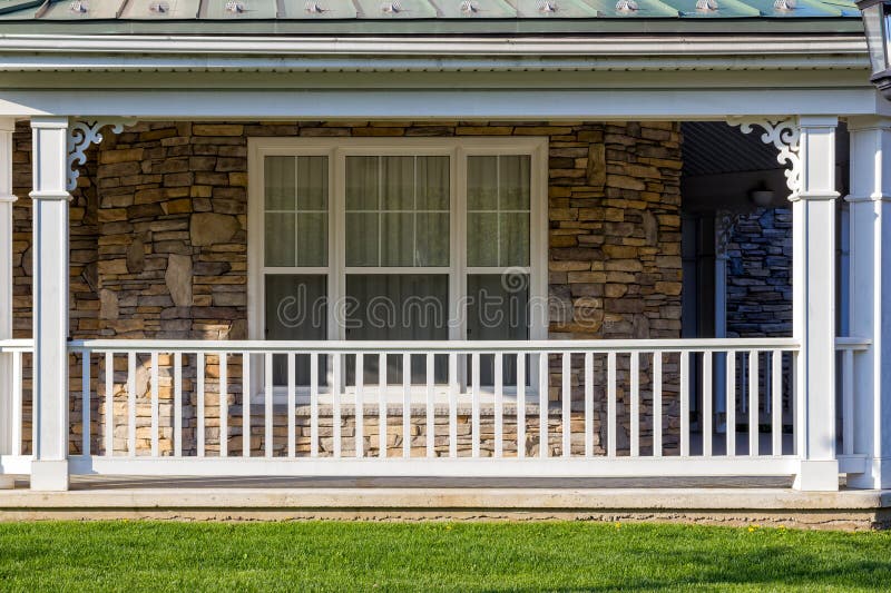 Porch with a white railing stock image. Image of house - 41005447