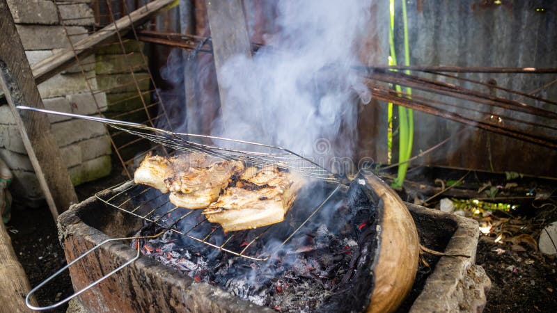 Pork Being Grilled on a Traditional Grill Stock Photo - Image of heat ...