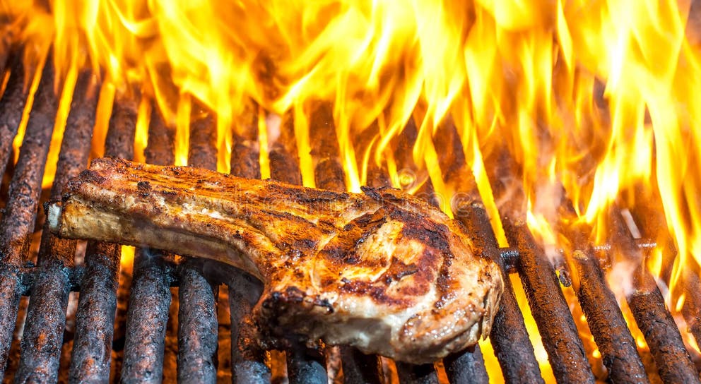 Pork Chop on Grill with Flames Stock Image - Image of fire, pork: 27673257