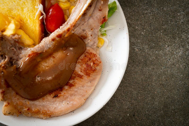 Pork Chop Steak with Chips and Mini Salad Stock Photo - Image of ...
