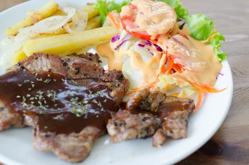 Pork chop steak stock photo. Image of cooked, cucumber - 40083364