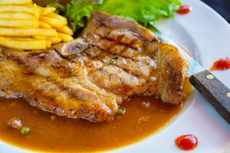 Pork chop steak stock photo. Image of lunch, meat, baked - 45608940