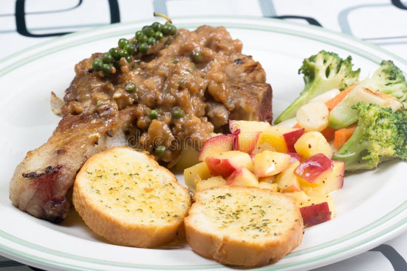 Pork chop steak stock photo. Image of parsnip, pepper - 74235162