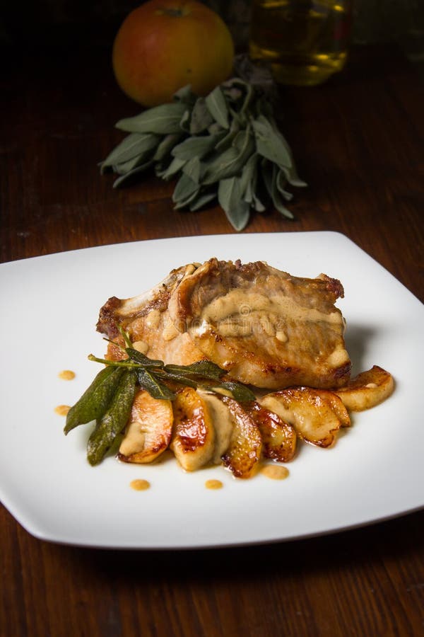 Pork Chops with Apples and Sage Stock Photo - Image of leaf, chop ... Pork Chops with Apples and Sage Stock Photo - Image of leaf, chop ...