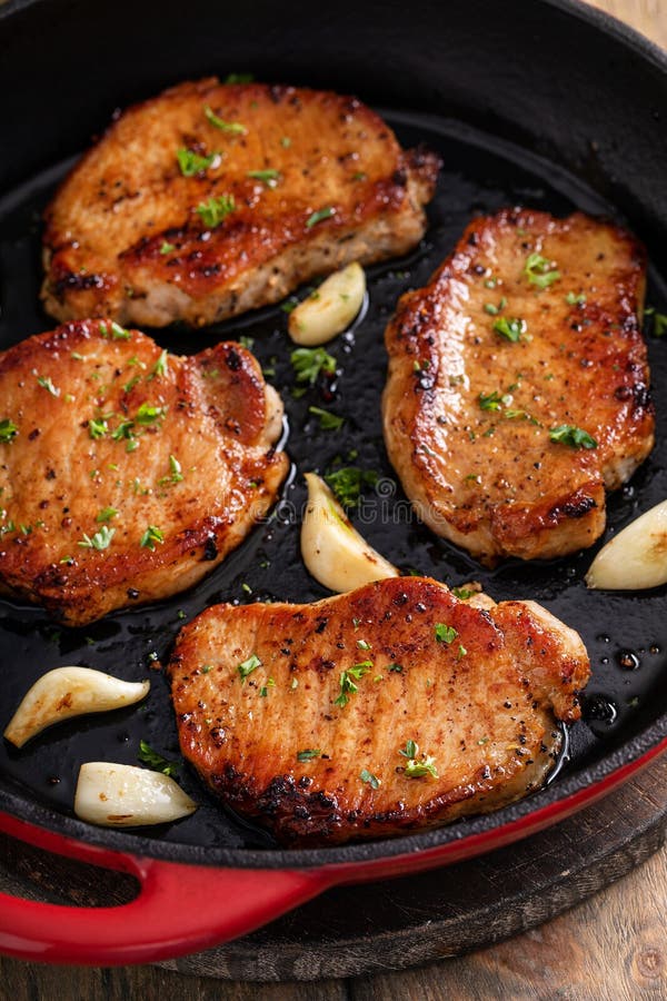 Pork Chops Cooked in a Cast Iron Pan Stock Photo - Image of cast, tasty ...