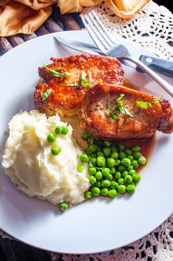 Pork Chops Mashed Potatoes stock photo. Image of dish - 152979868