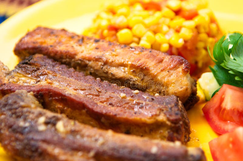 The Pork Chops with Roasted Corn Stock Photo - Image of roasted, corn ...