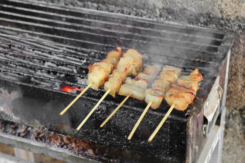 Pork Cook on the Bar-b-que Grill in Thai Style with Fire Smoke Stock ...