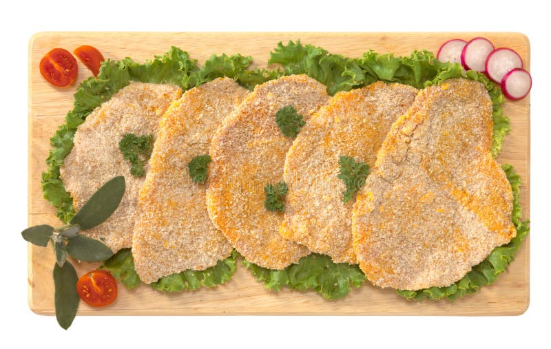 Pork Cutlet with French Fries, Green Salad and Quail Egg Stock Photo ...