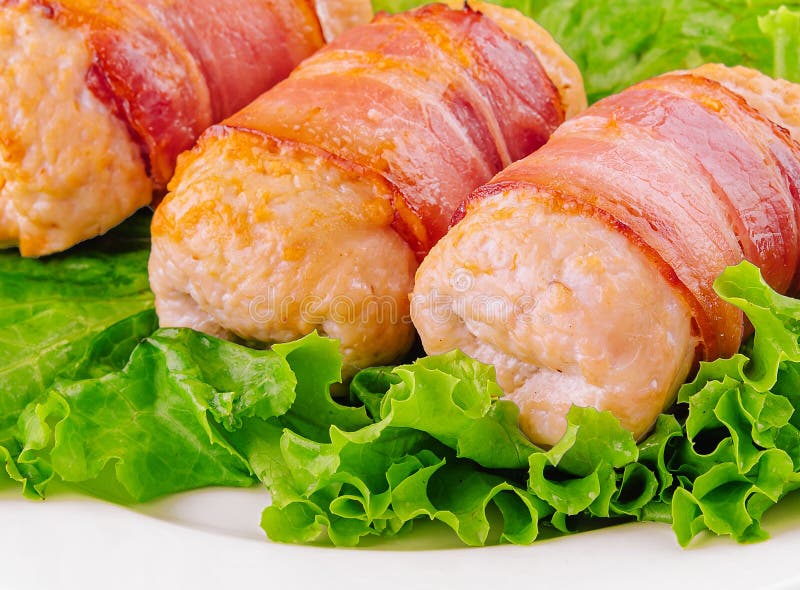 Pork Cutlets Wrapped in Bacon on White Stock Photo - Image of roasted ...