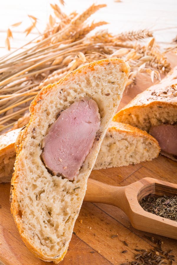 Pork Fillet in the Bread Brown Stock Photo - Image of dish, cereals ...