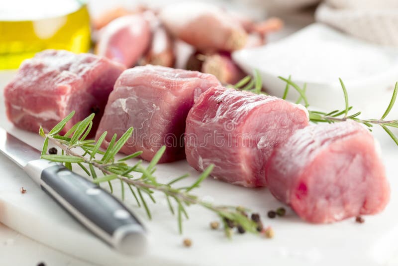 Pork Fillet. Raw Meat with Spices on Cutting Board. Stock Image - Image ...