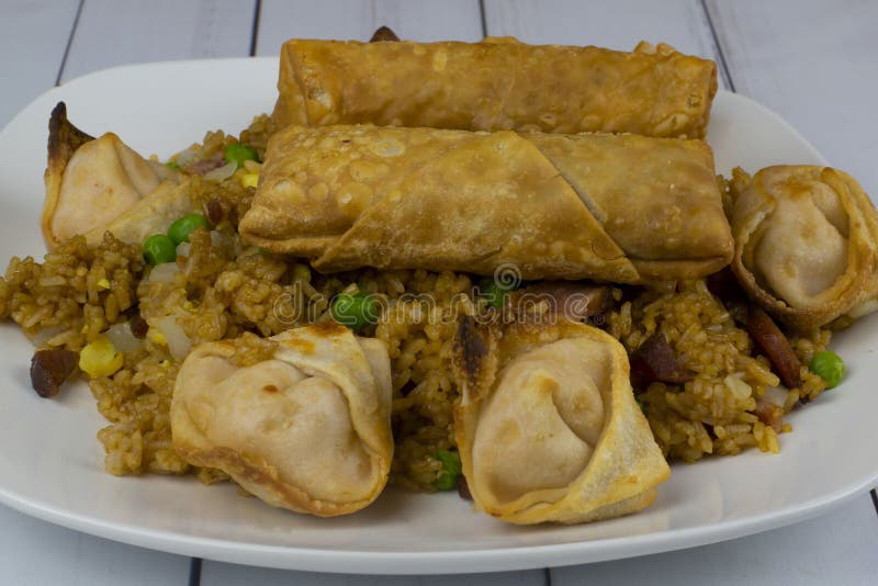 Lobster Rangoon with Pork Fried Rice and Egg Rolls Stock Photo - Image ...