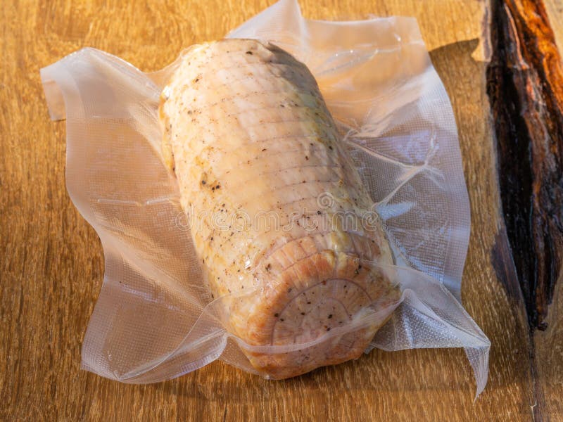 Pork Ham in Vacuum Packaging on a Wooden Table Stock Image - Image of ...