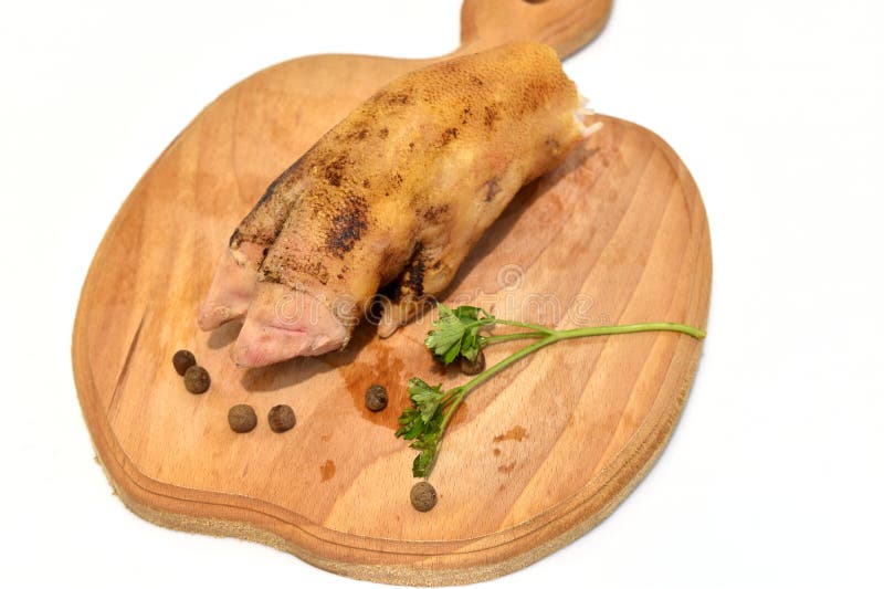 A Pork Leg with Hooves Lies on the Board. Stock Photo - Image of ...