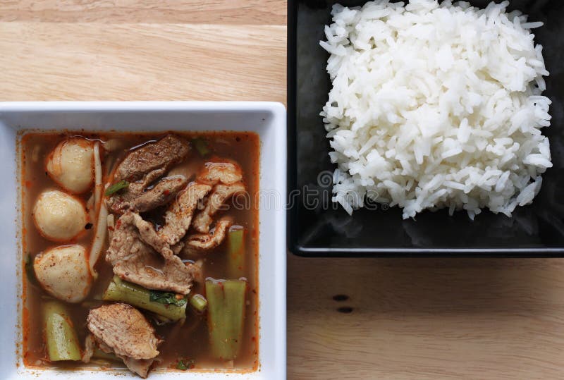 Pork Noodle Soup Served with Rice Stock Image - Image of soup, brown ...