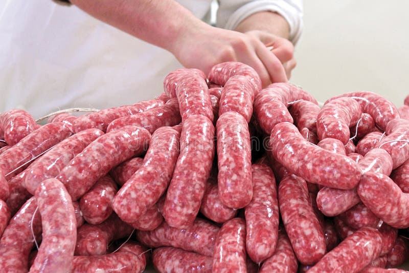 Pork processing, sausages stock photo. Image of restaurant - 105936882