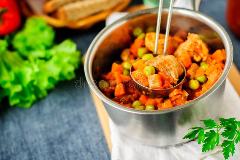 Pork Ragout with Carrots and Green Peas Stock Photo - Image of lunch ...
