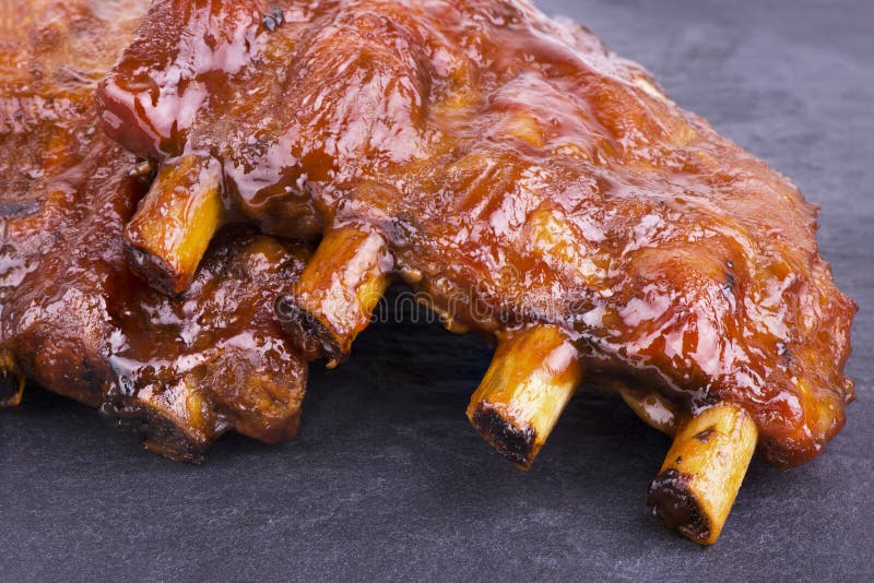 A rack of bbq pork ribs stock photo. Image of back, meal - 24050622