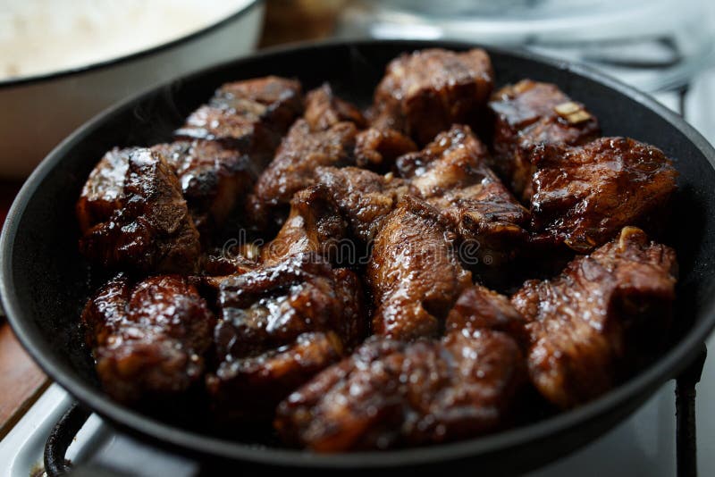 Pork ribs fried in a pan. stock photo. Image of dinner - 108067214