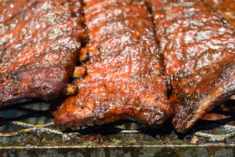 Pork Ribs on the Grill stock photo. Image of sauce, grilled - 27813708