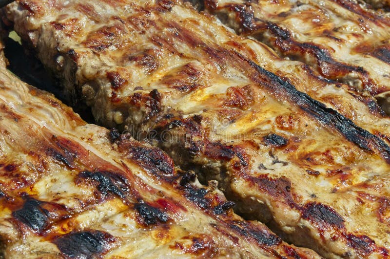 Pork ribs on the grill stock image. Image of grilled - 185795721