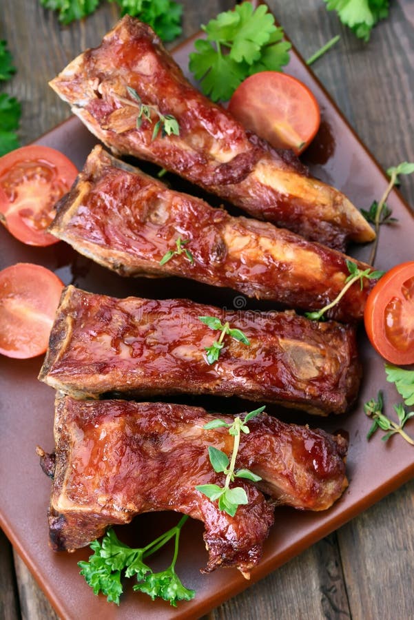 Pork ribs on plate stock image. Image of meal, grilled - 53997567