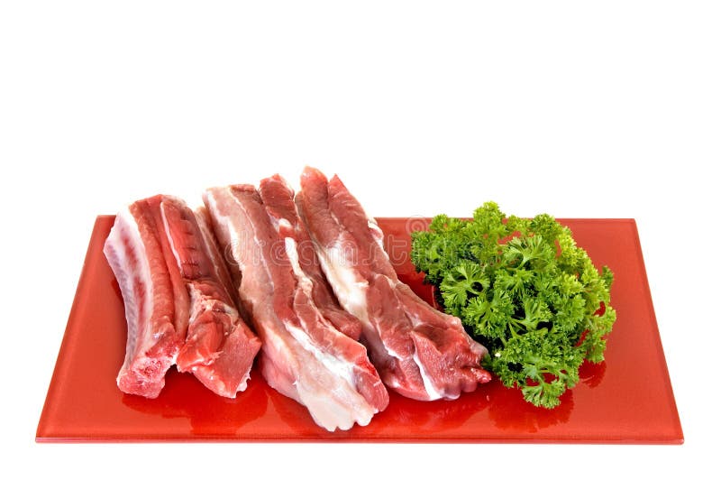 Pork ribs on red plate stock image. Image of nutrition - 6082721