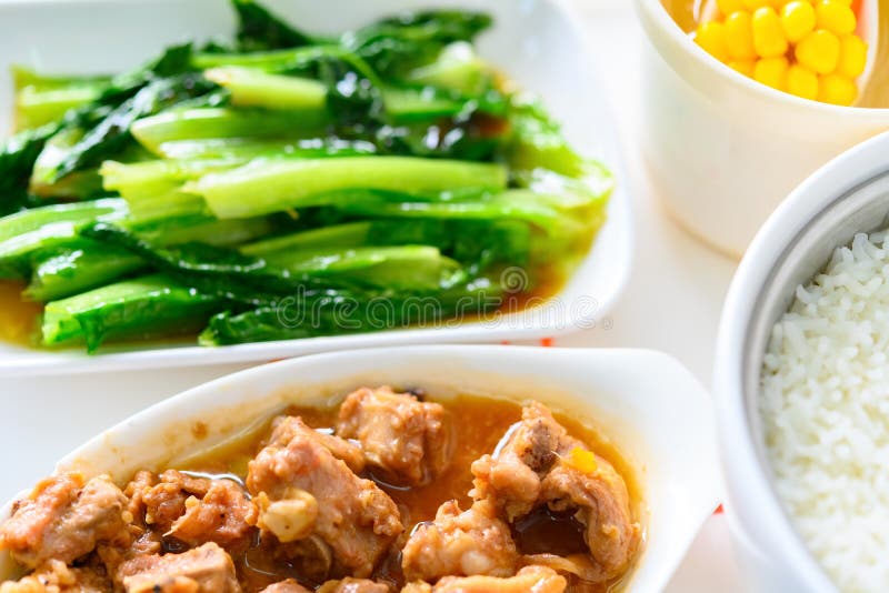 Pork Ribs and Vegetable and Maize Soup and Rice As a Meal Stock Image ...