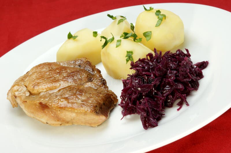 Pork Roast with Potatoes and Red Cabbage Stock Image - Image of ...
