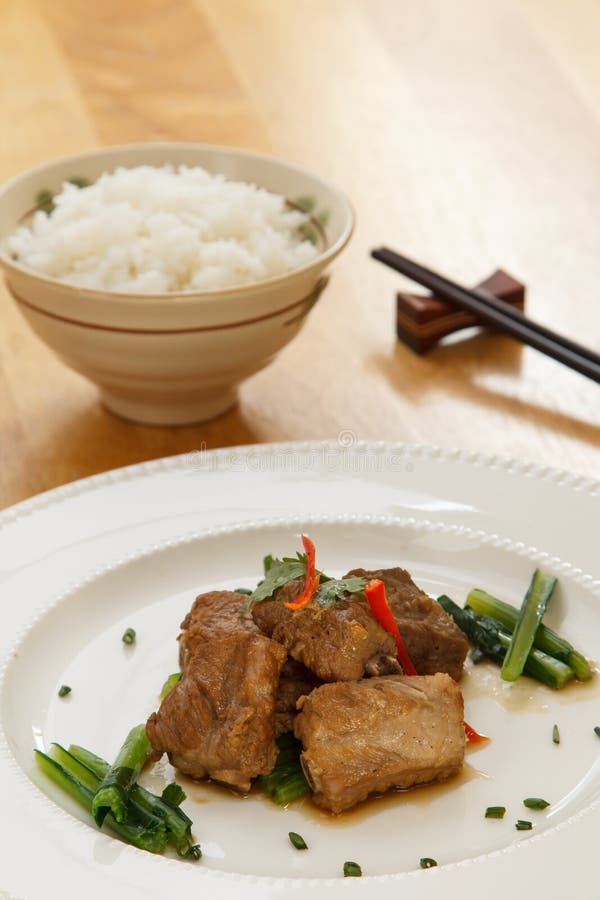 Pork roast with rice stock photo. Image of garnish, dinner - 31451846