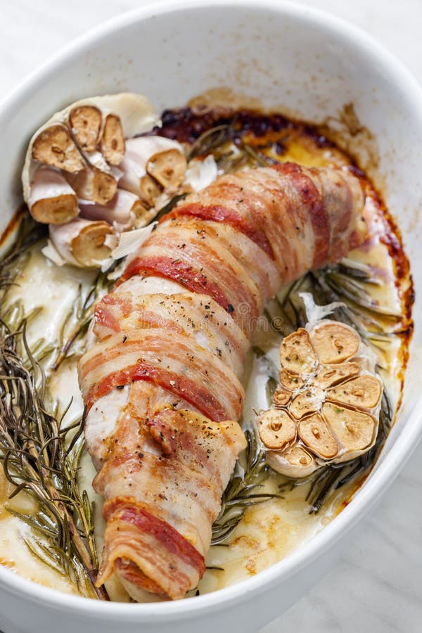 Pork roll wrapped in bacon stock photo. Image of meal - 243153754