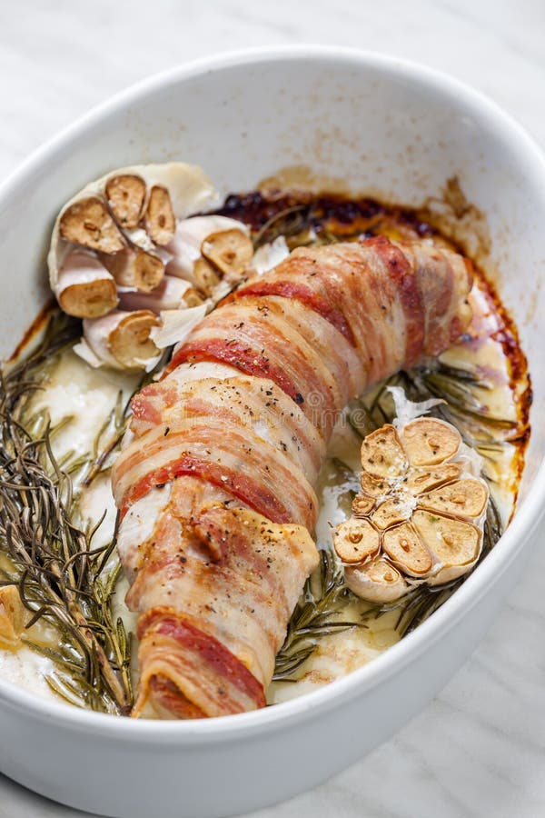 Pork roll wrapped in bacon stock image. Image of close - 254683787