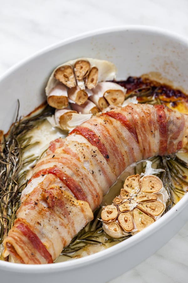 Pork roll wrapped in bacon stock image. Image of close - 224729299