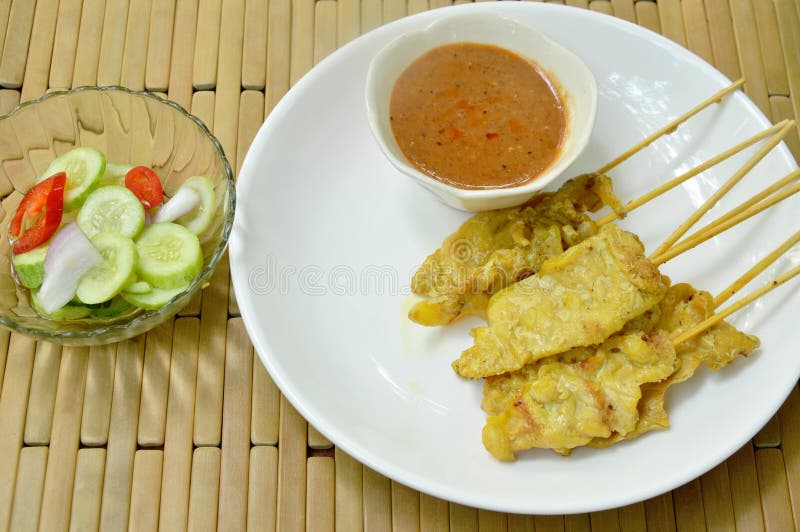 Pork Satay with Peanut Sauce and Pickled Vegetable Cup Stock Photo ...