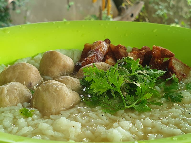 Pork Soup Boiled Rice with Meatballs and Crispy Pork. Stock Image ...