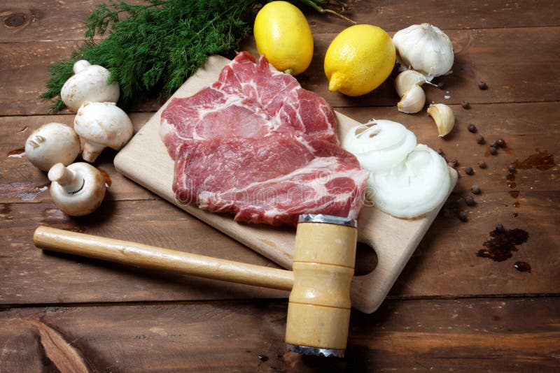 Pork steak and mallet stock image. Image of chop, domestic - 16701529