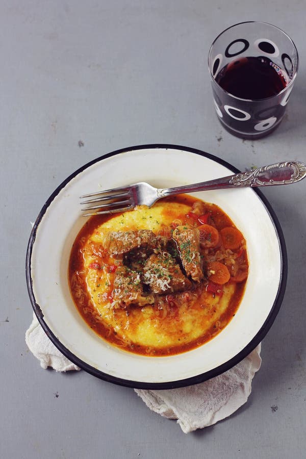 Pork stew with polenta stock photo. Image of delicious - 65735038