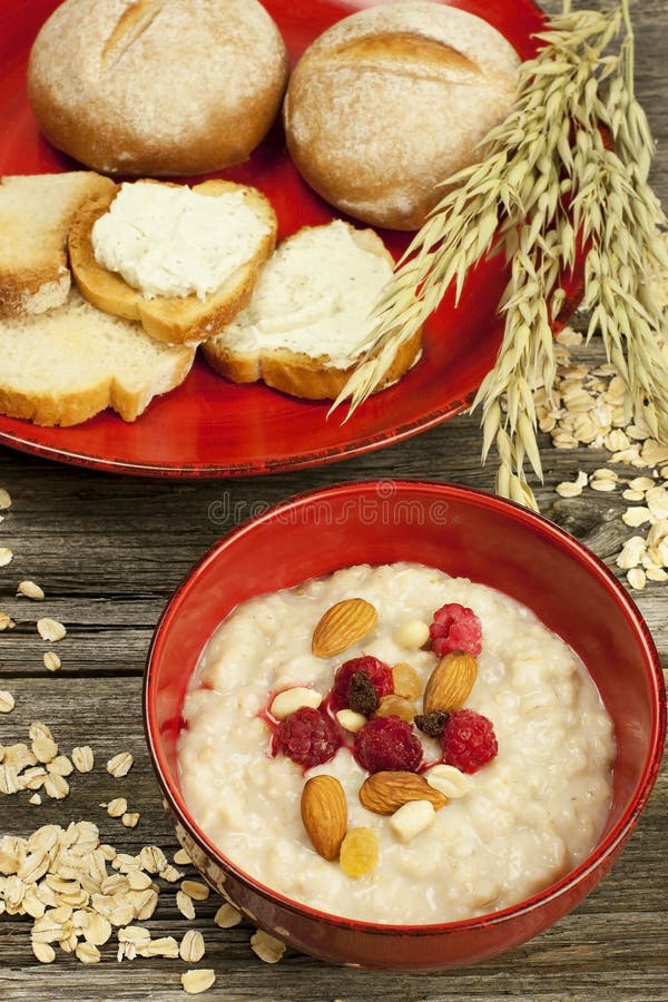 Porridge with Fresh Raspberry and Almonds Nuts Stock Image - Image of ...