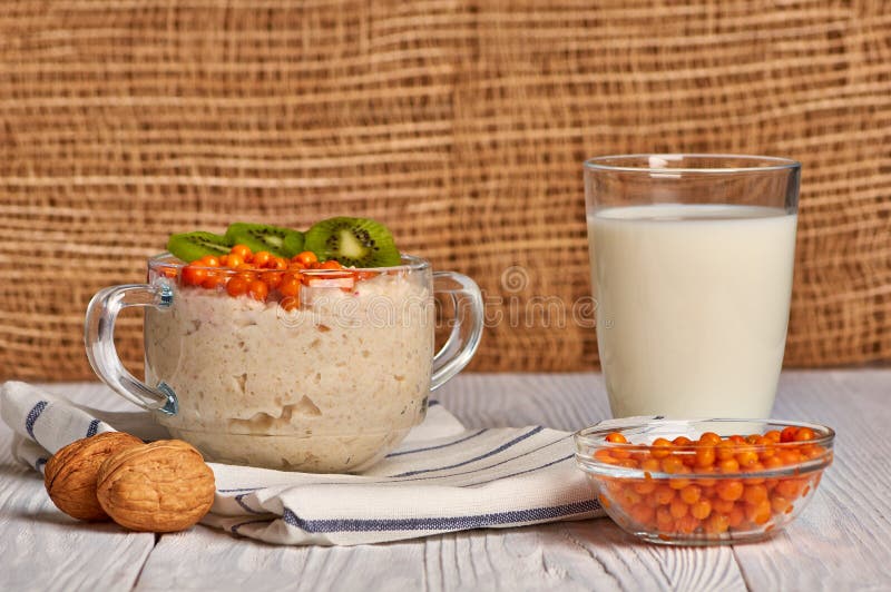 Porridge with Fruit on Wooden Background Stock Image - Image of berries ...